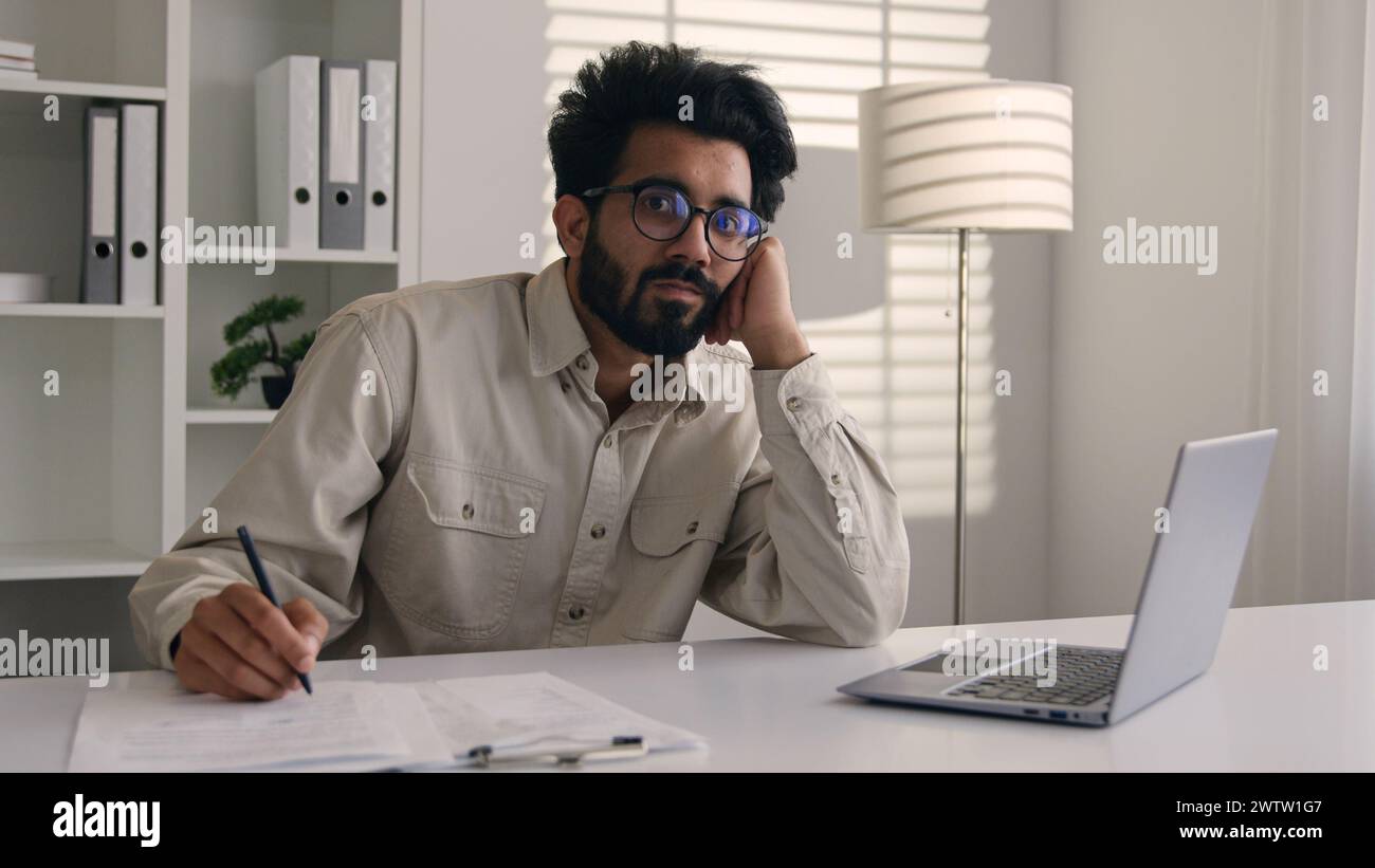 Tired bored Arabian Indian man businessman lazy employee manager boring ...