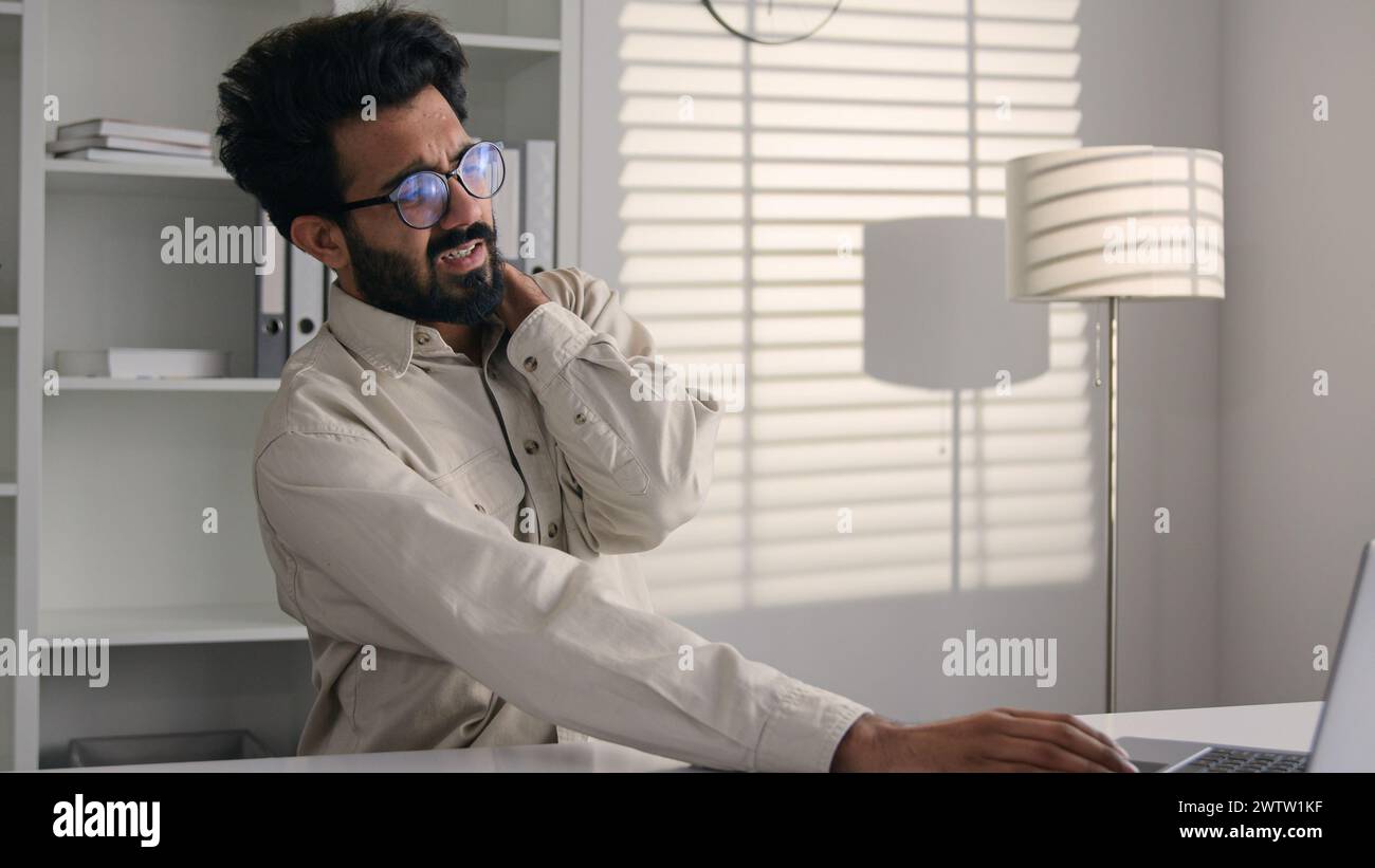 Tired displeased Indian Arabian business man businessman office manager ...