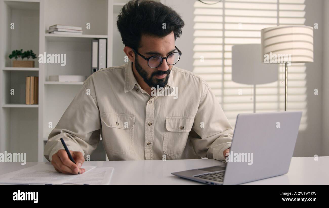 Indian businessman signing document hi-res stock photography and images ...