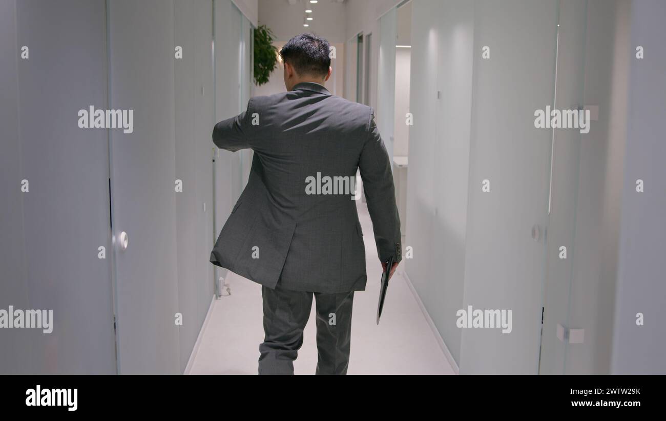 Back view adult businessman Asian ethnic man guy employer going to ...