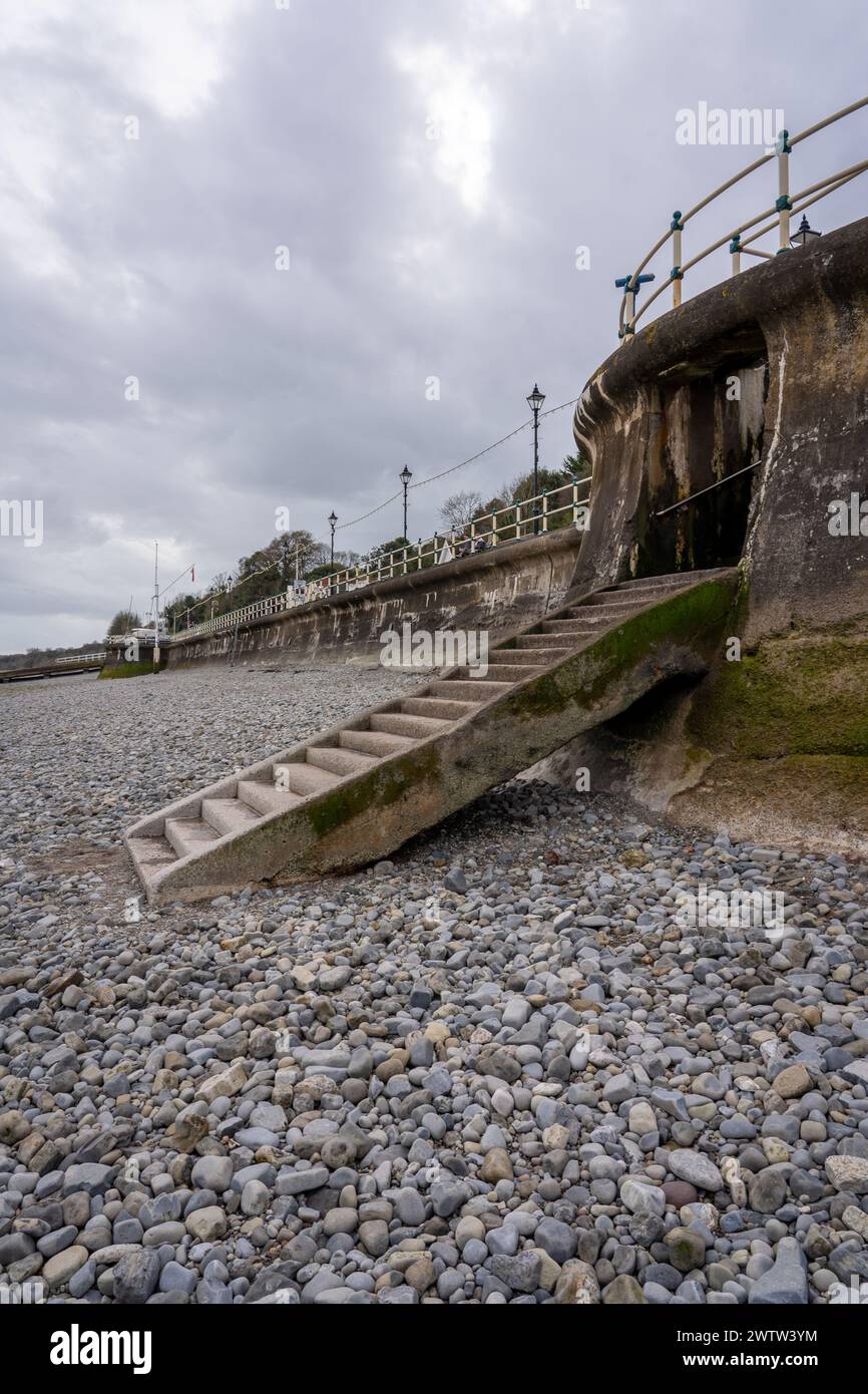The shingle beach and steps from promenade, Penarth, South Wales Stock ...
