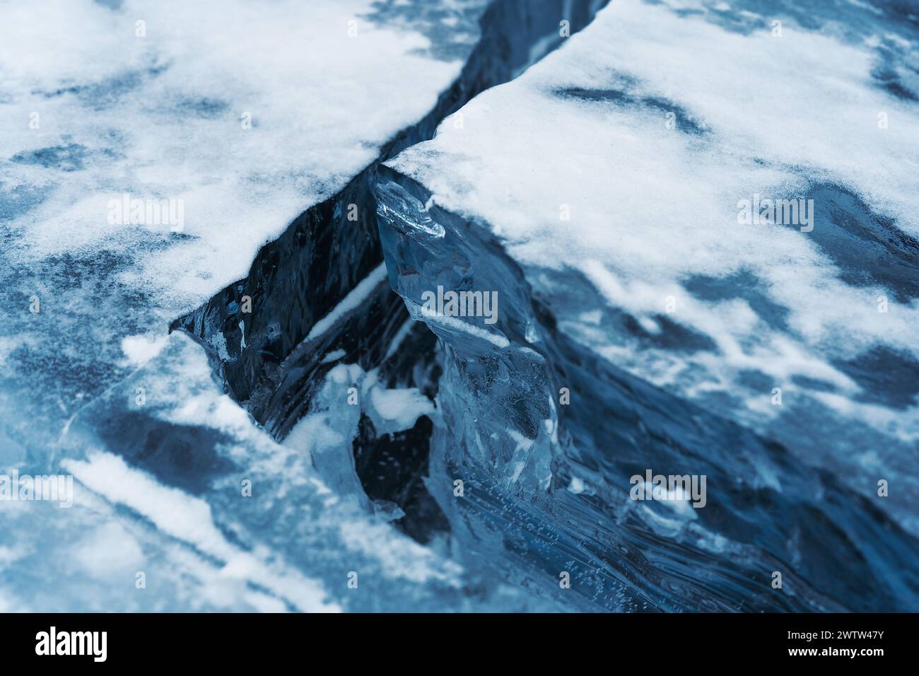 Ice hummocks on Baikal Lake. Transparent blue ice floe. Natural ...