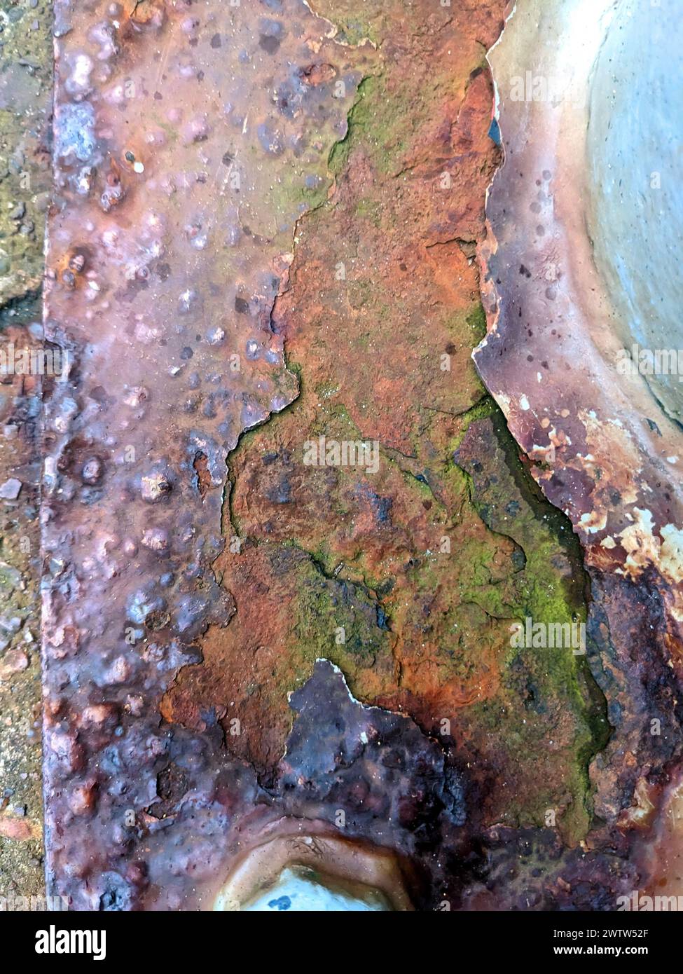 A Close Up of a Rusted Iron Metal Industrial Floor with a Bolt in An ...