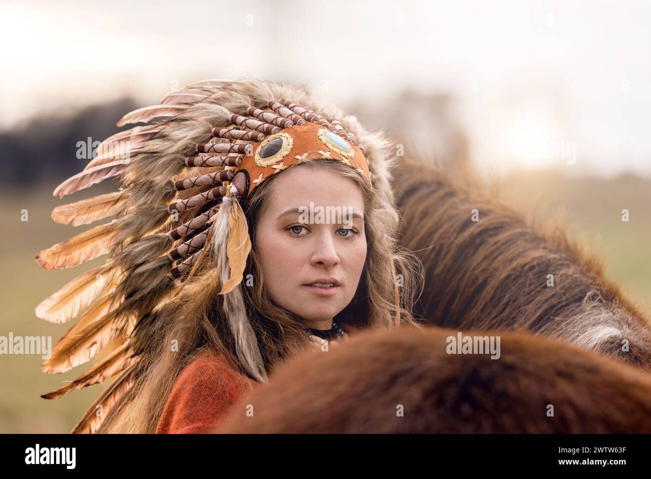 female warrior: American native inspired scene of a young woman and her ...