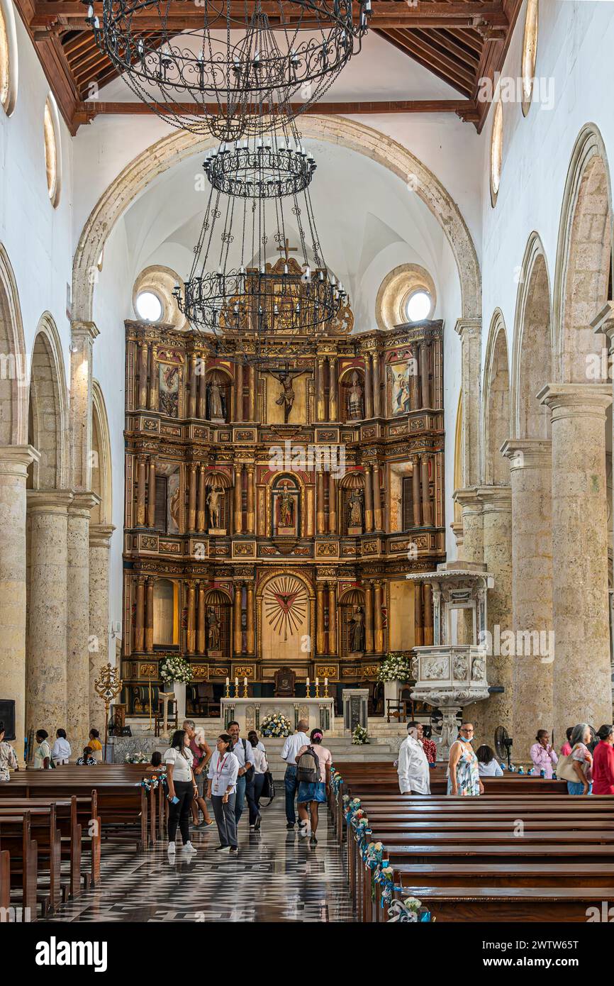 Cartagena, Colombia - July 25, 2023: Catedral de Santa Catalina de Alejandría. Huge wood, golden ...