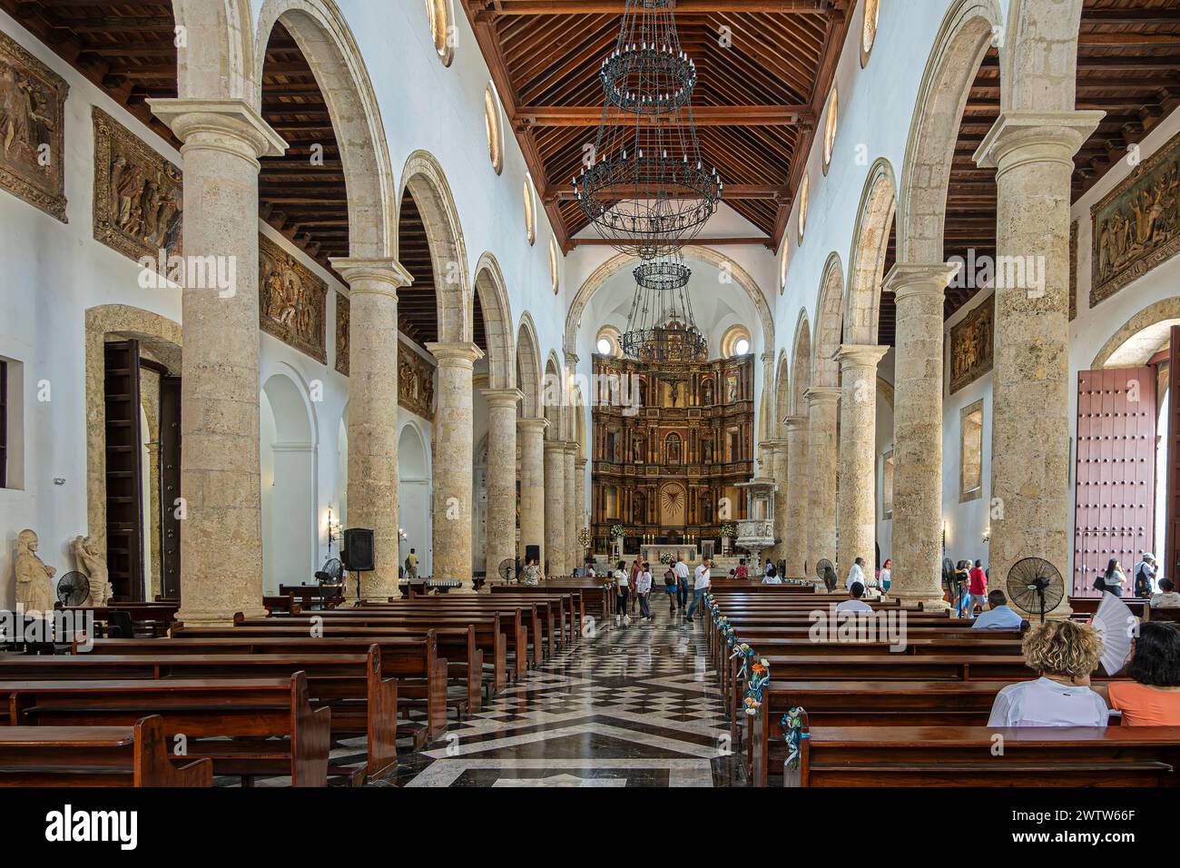 Cartagena, Colombia - July 25, 2023: Catedral de Santa Catalina de Alejandría. Huge wood, golden ...