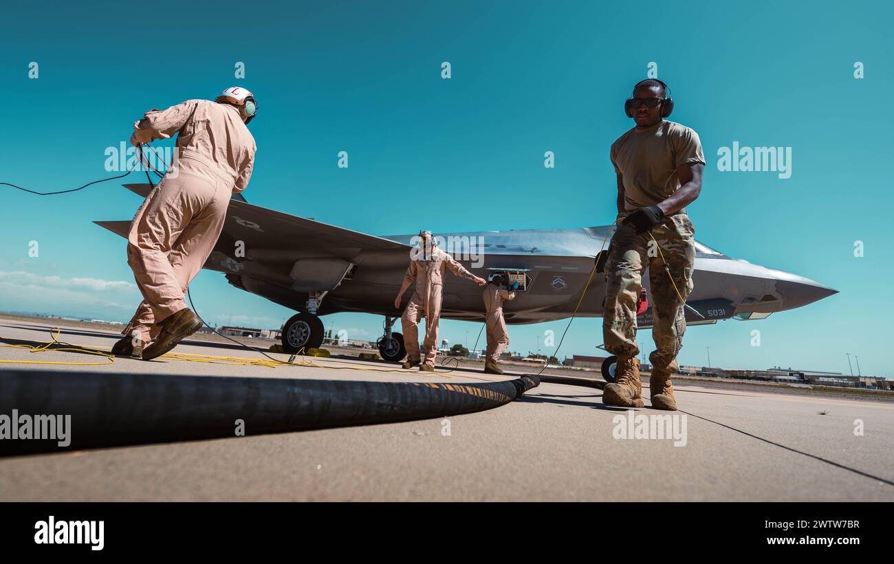 U.S. Air Force crew chiefs and U.S. Marine Corps plane captains perform ...