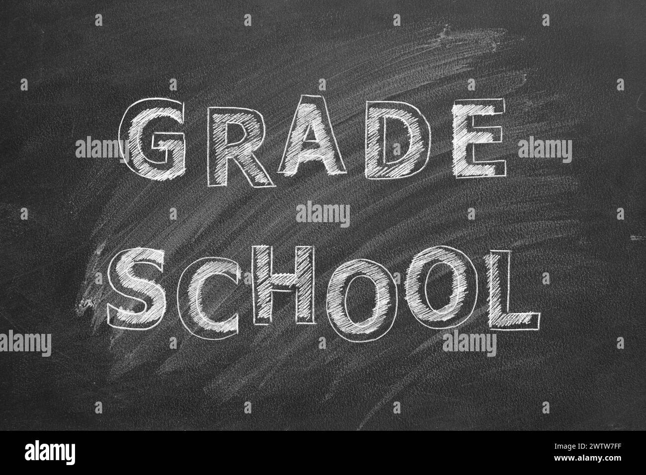 Lettering GRADE SCHOOL on a black chalkboard Stock Photo - Alamy