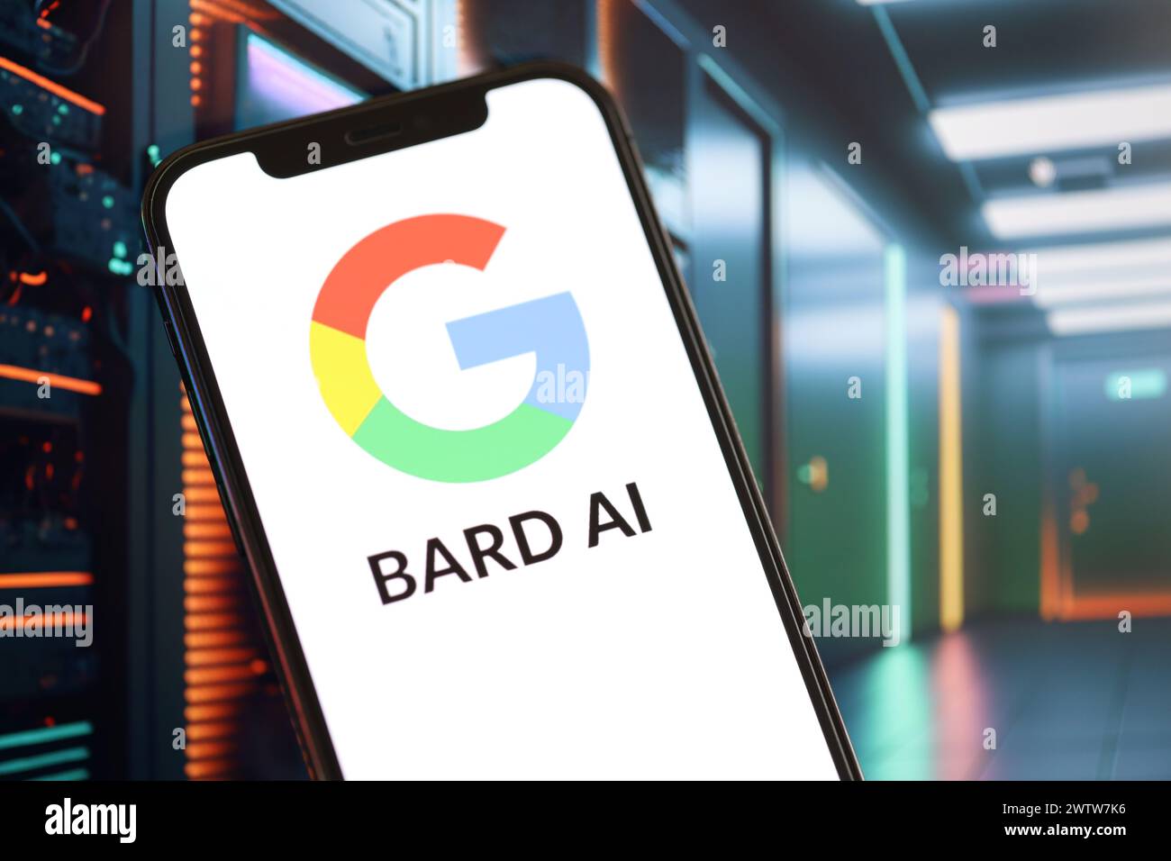KYIV, UKRAINE - MARCH 17, 2024 Google Bard logo on iPhone display screen with background of ...