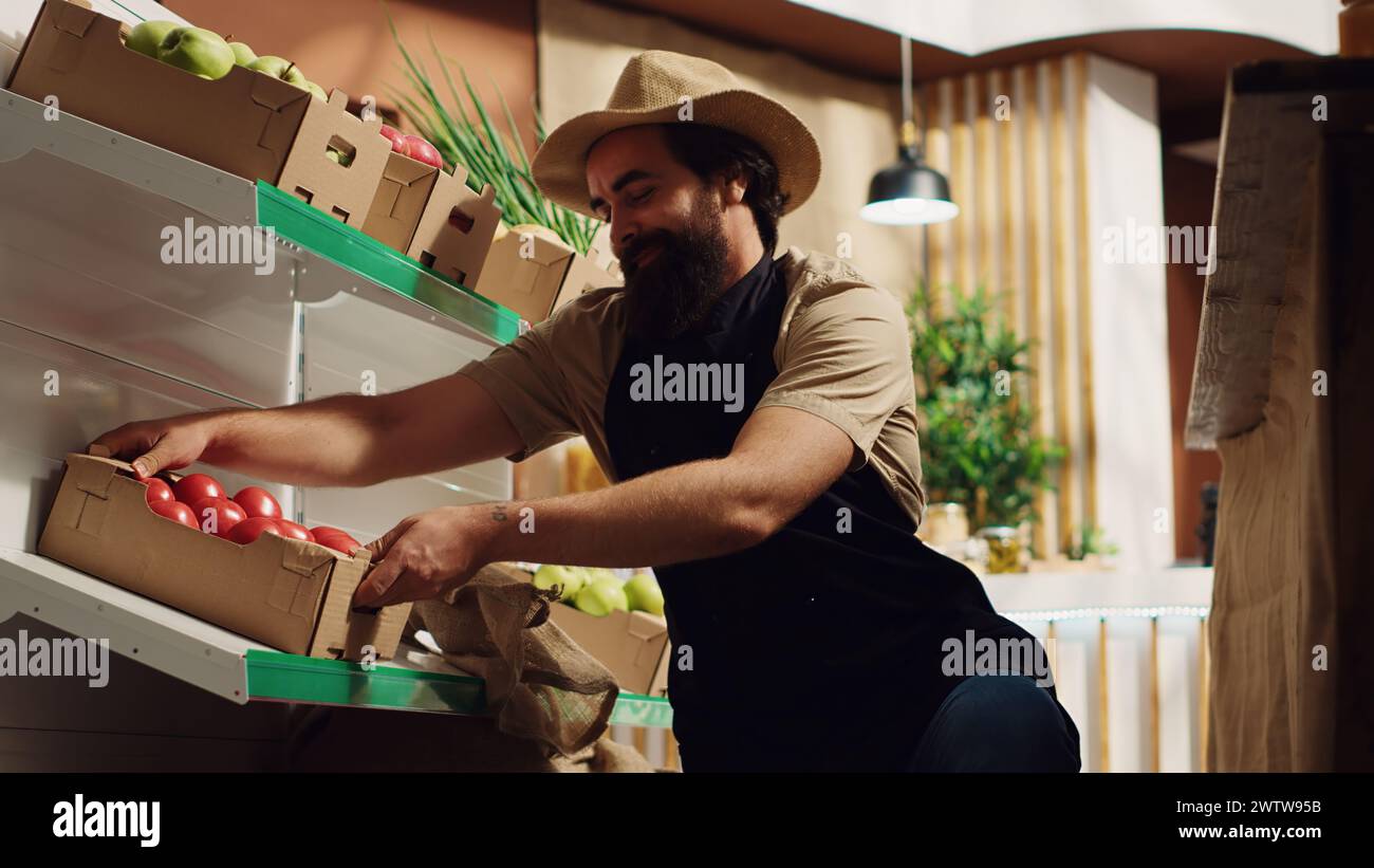Farmer bringing boxes of fresh produce, restocking local neighborhood ...