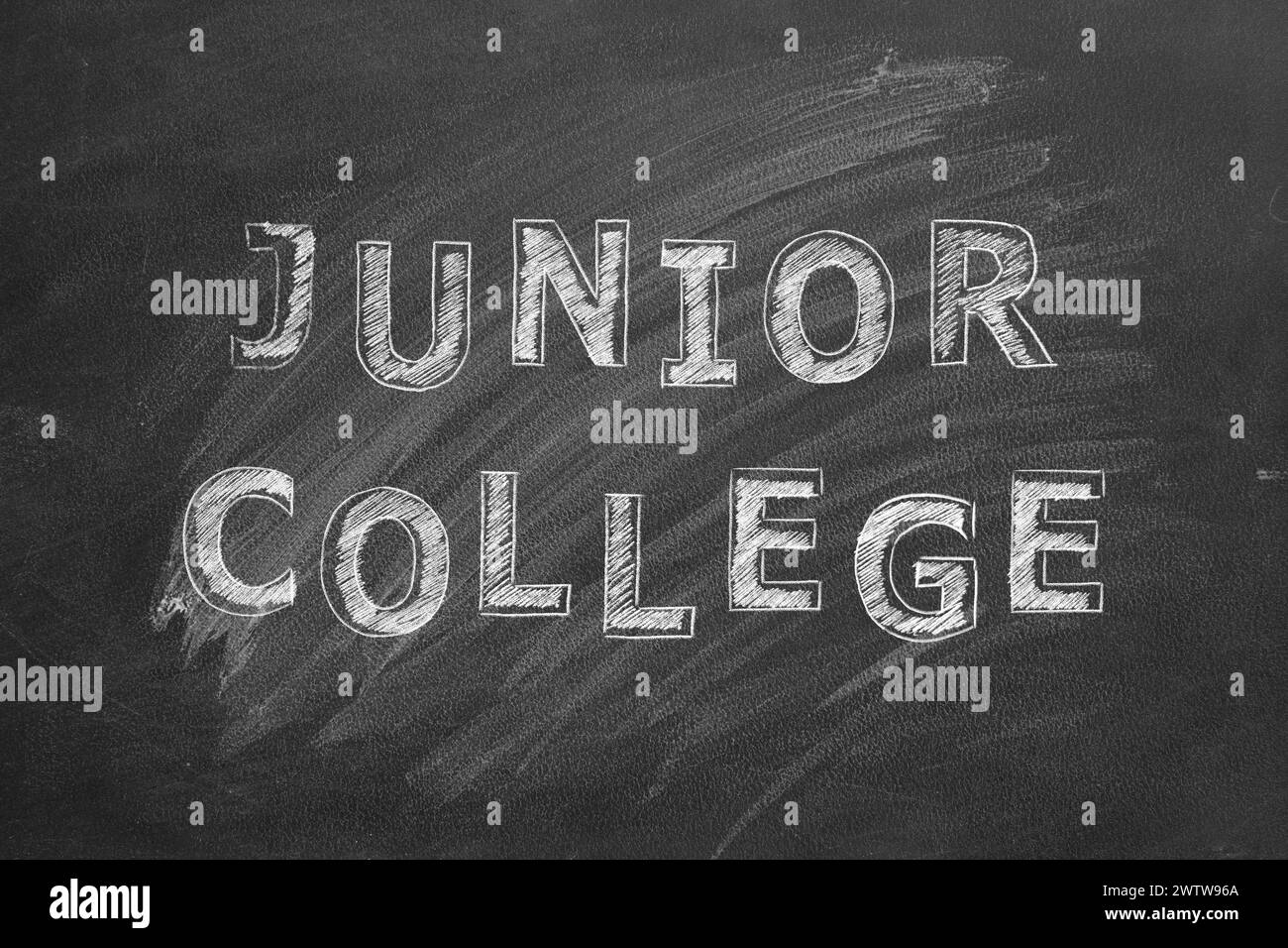 Hand drawing text Junior college on black chalkboard Stock Photo - Alamy