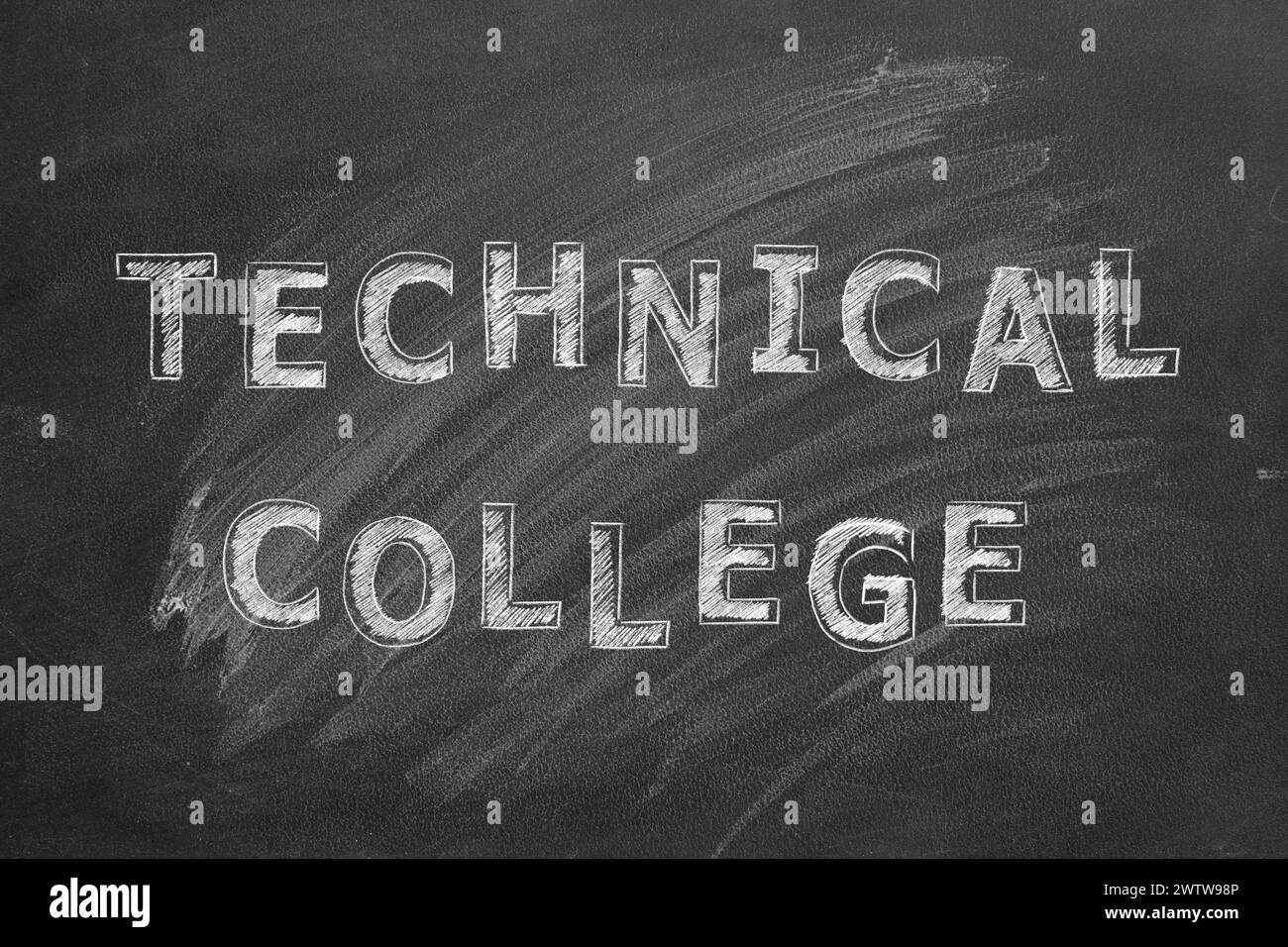 Hand drawing text Technical college on black chalkboard Stock Photo - Alamy