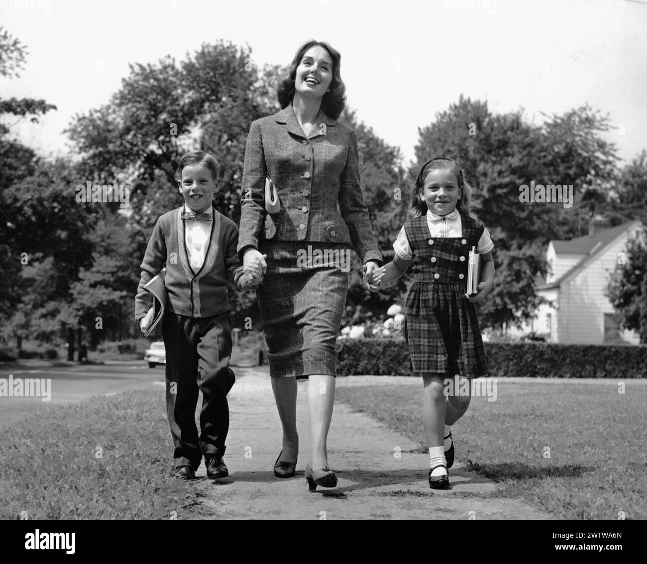 Kids walking into school Black and White Stock Photos & Images - Alamy