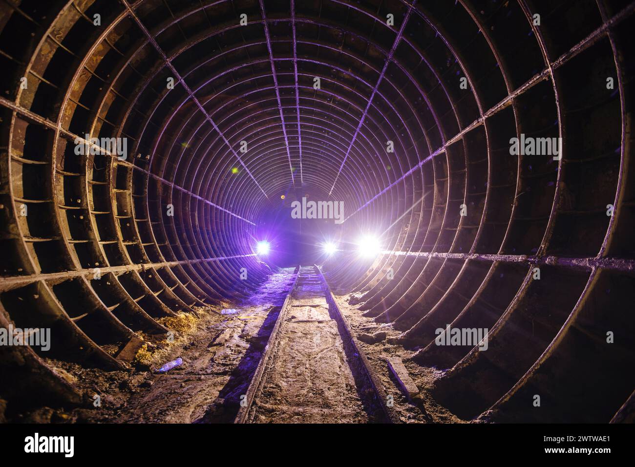 Dark dirty abandoned subway tunnel with rusty railway Stock Photo - Alamy