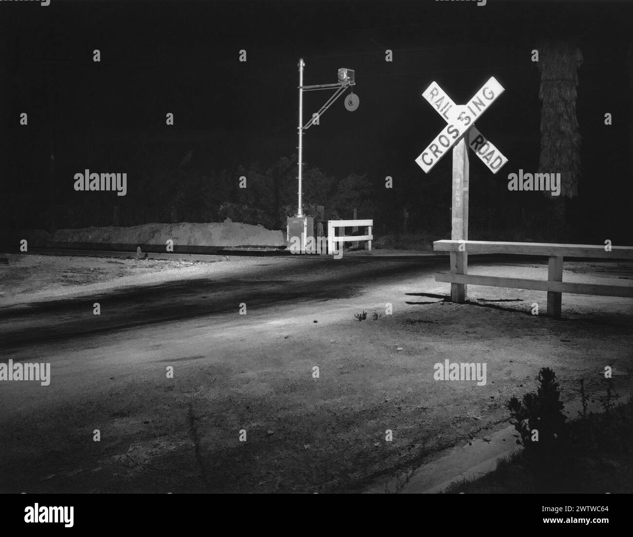 Train track crossing warning sign Black and White Stock Photos & Images ...