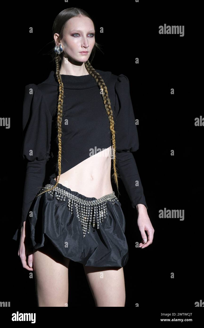 Parades with ODETTE ALVAREZ design during Mercedes Benz Fashion Week ...