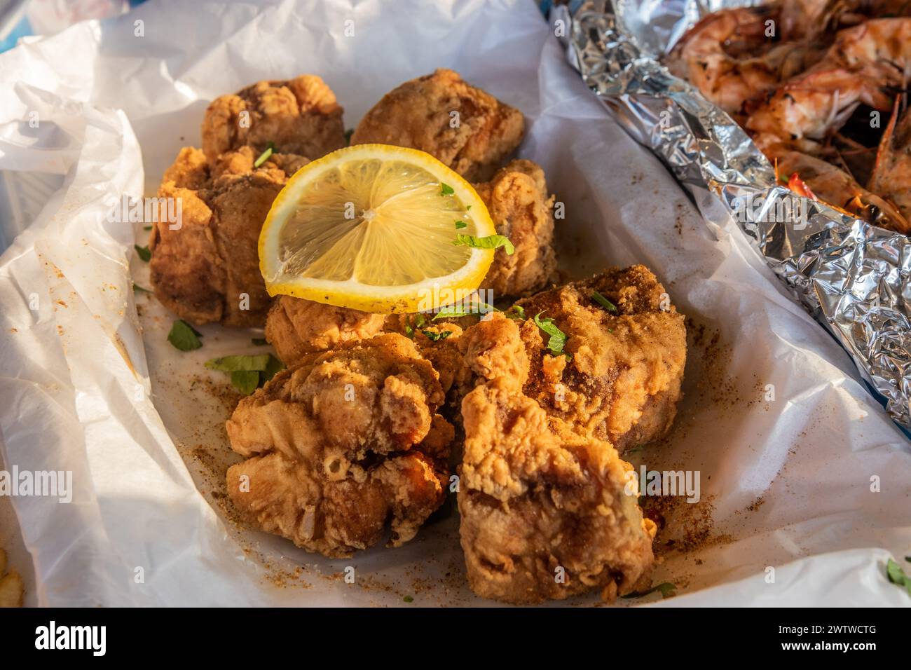 Fried shark in a restaurant at Al Mina Market in Abu Dhabi, United Arab ...