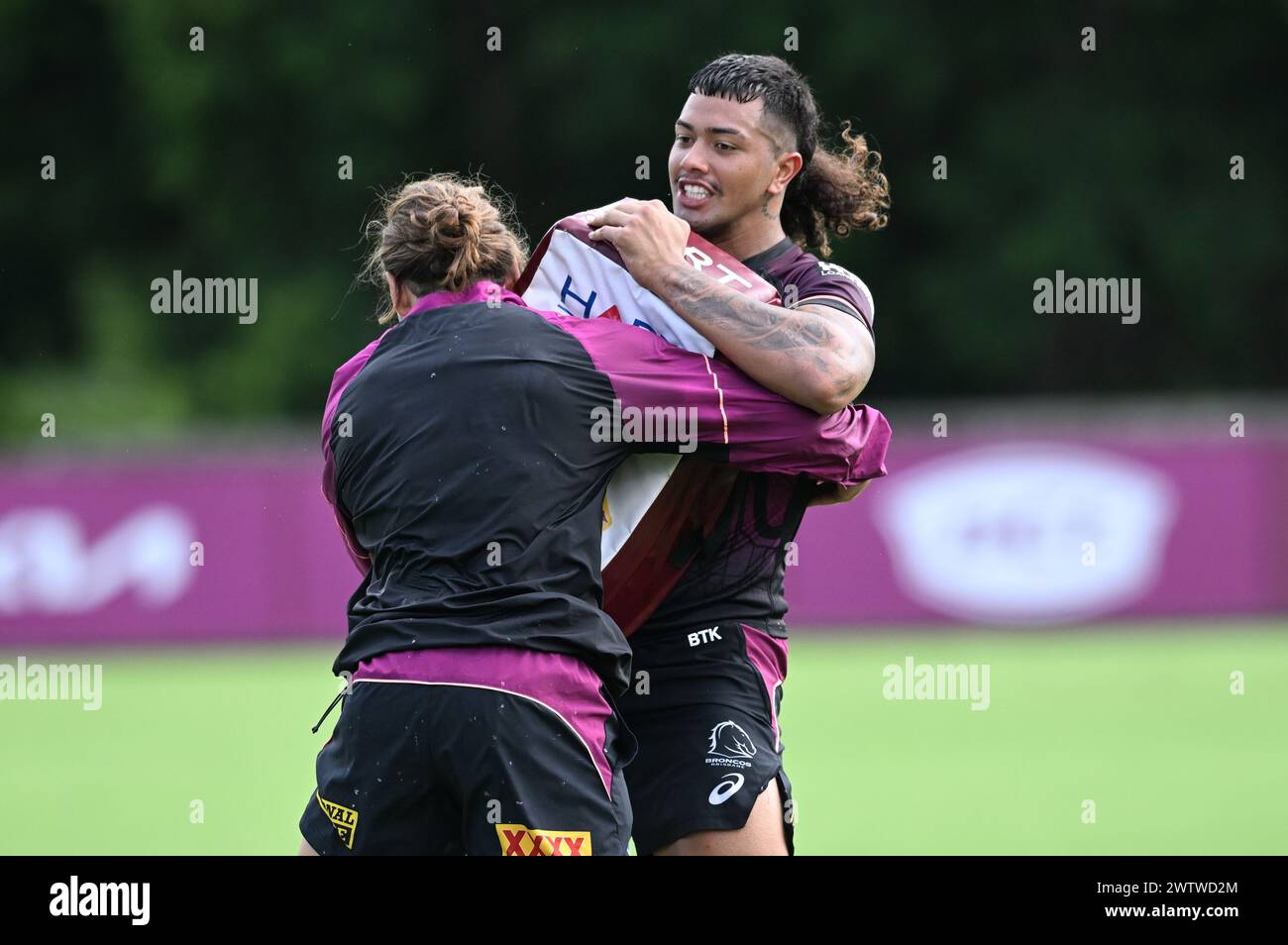 Brisbane, Australia. 20th Mar, 2024. Xavier Willison (right) tackles ...