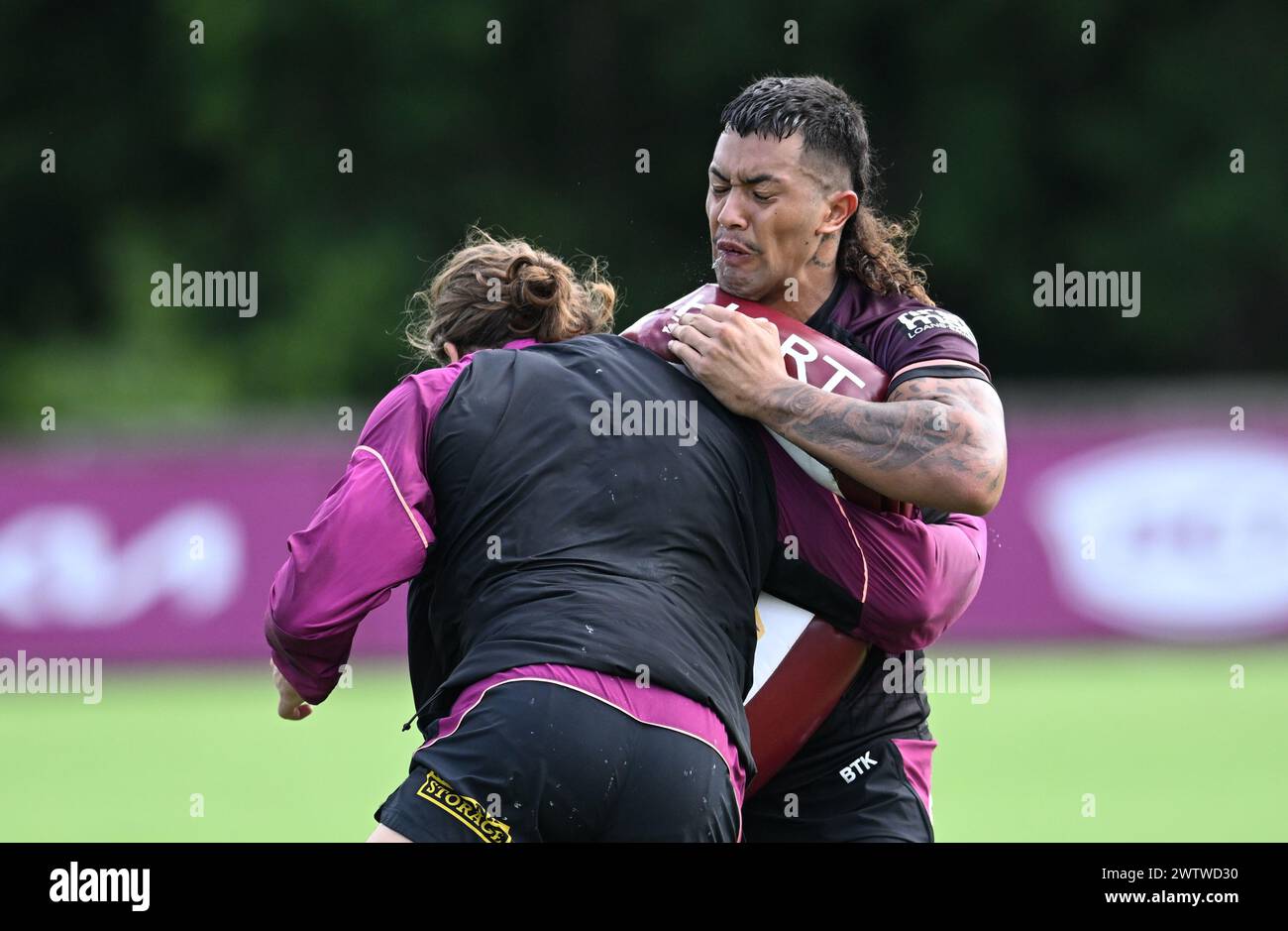 Brisbane, Australia. 20th Mar, 2024. Xavier Willison (right) tackles ...