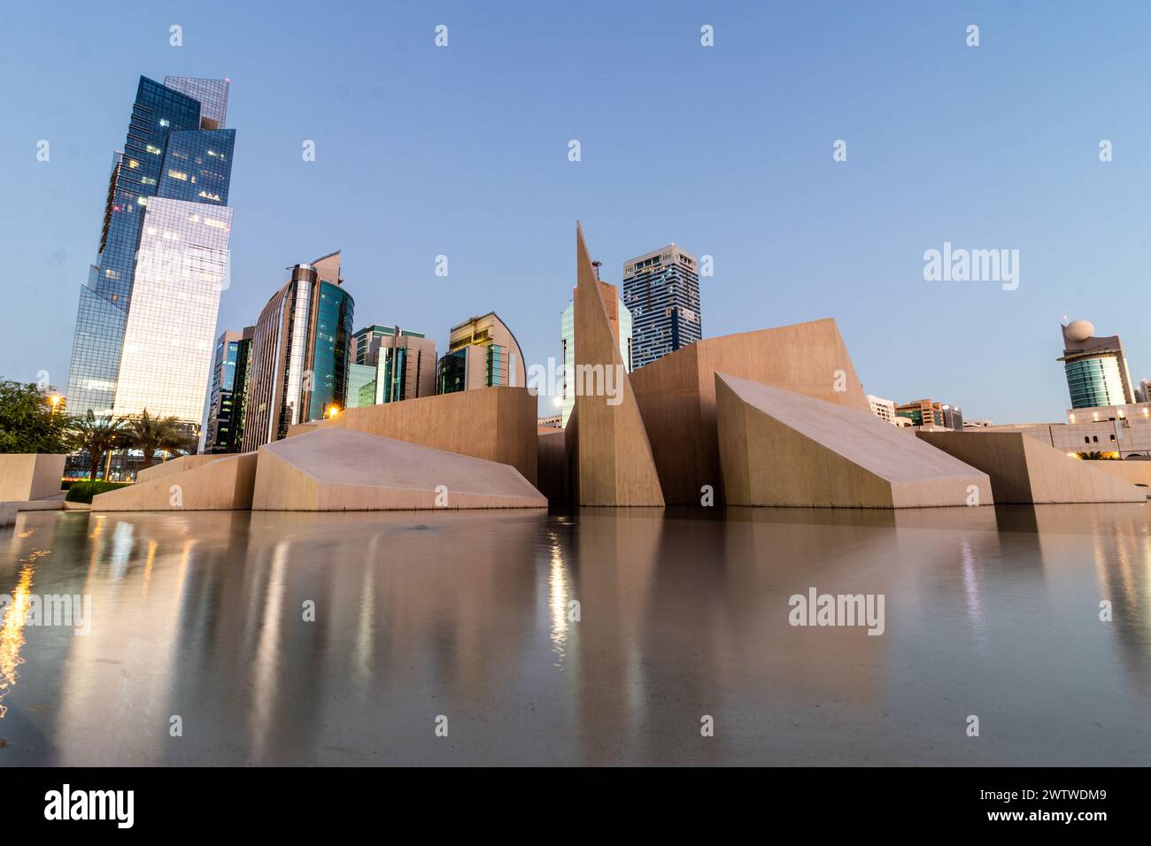 Evening view of skyscrapers and Musalla Al Hosn mosque in Abu Dhabi ...