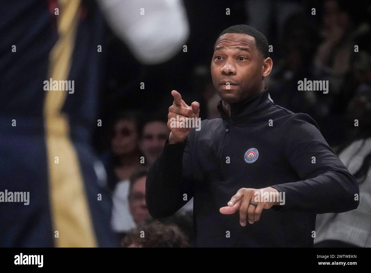 New Orleans Pelicans' head coach Willie Green talks to a player during ...