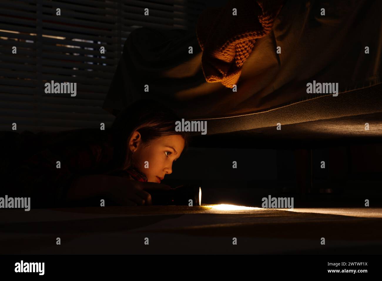 Child preteen flashlight bed hi-res stock photography and images - Alamy