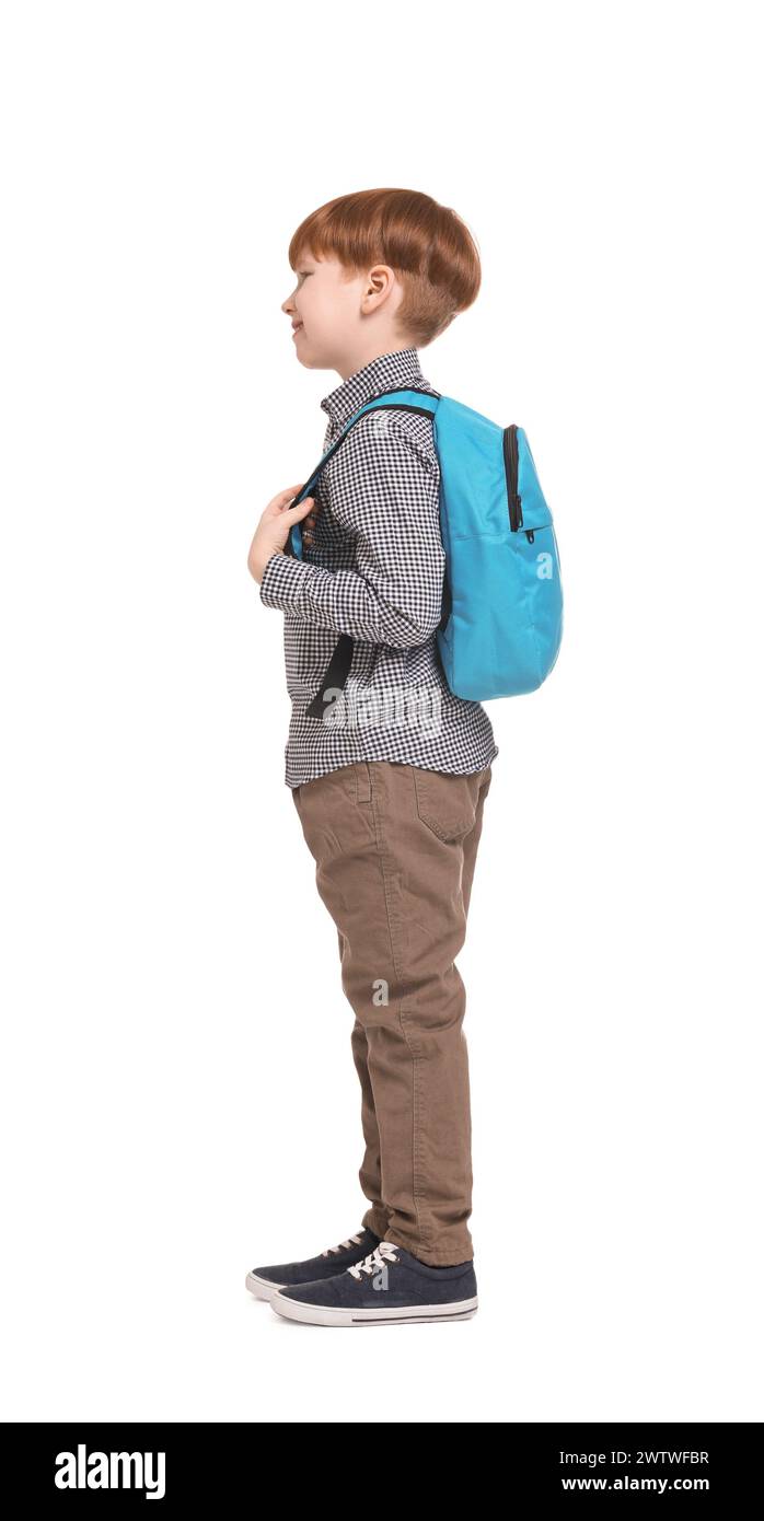 Little boy with backpack on white background Stock Photo - Alamy