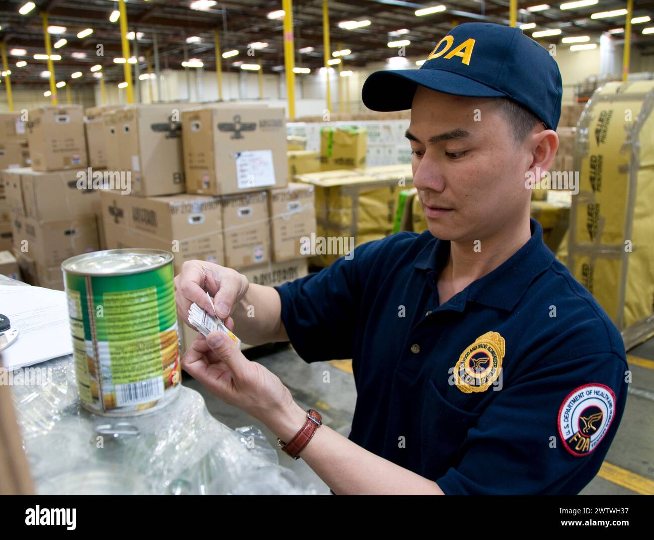An FDA field inspector conducts on-site chemical analysis of imported ...