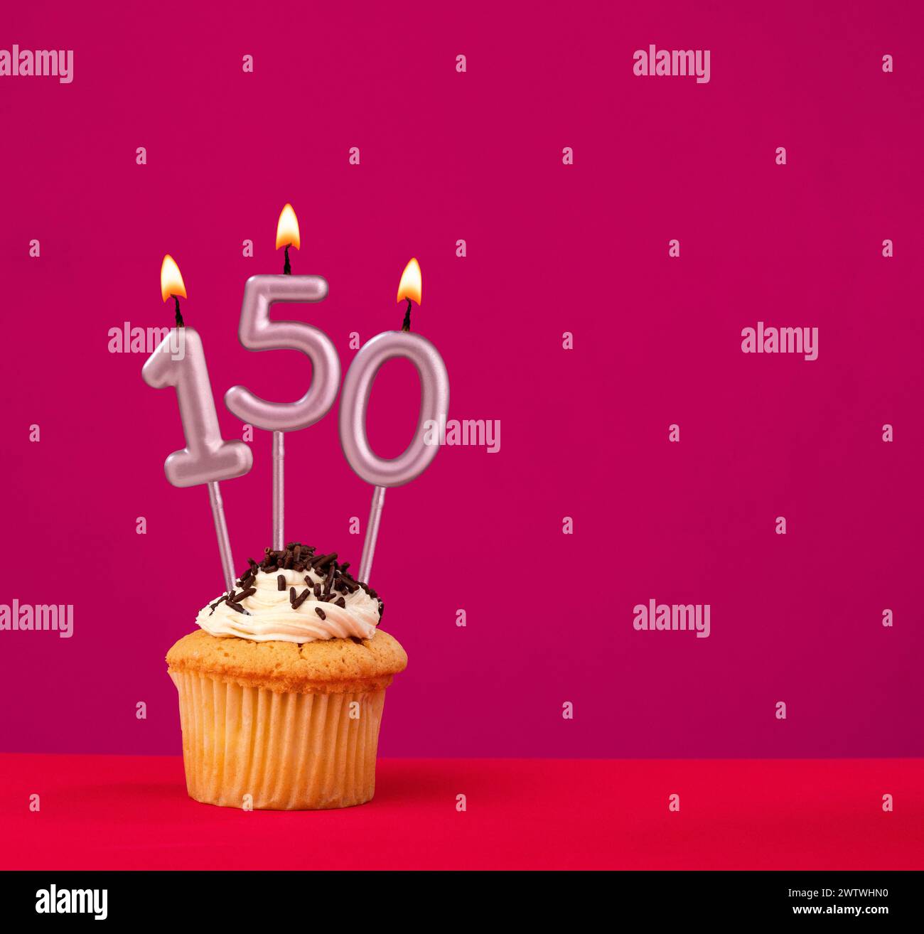Candle number 150 - cupcake birthday in rhodamine red background Stock ...