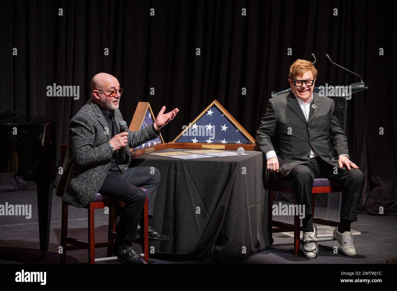 Bernie Taupin speaks after he and Elton John, right, were awarded the 2024 Library of Congress ...