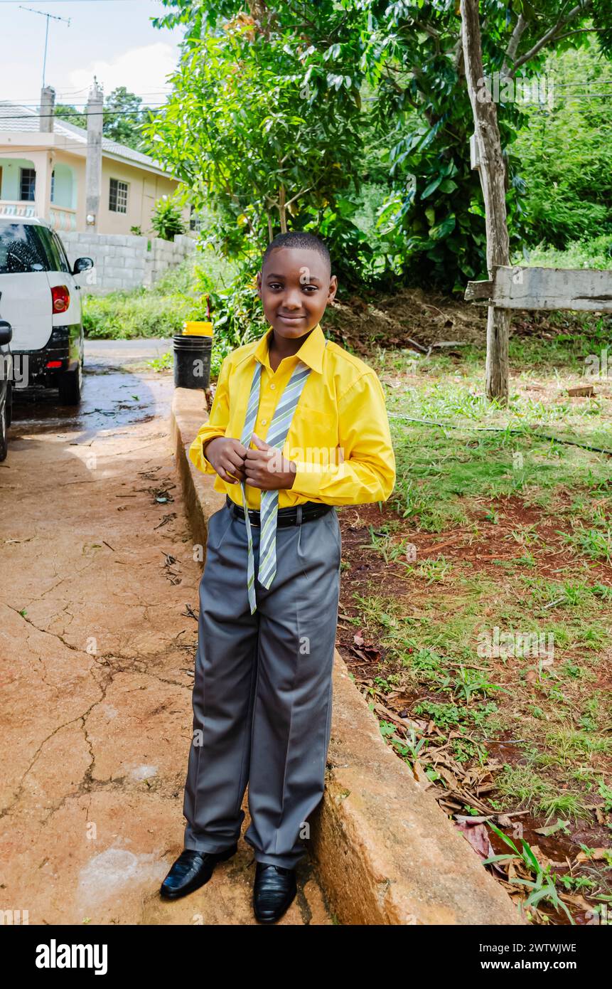 Boy In Yellow Standing Stock Photo - Alamy