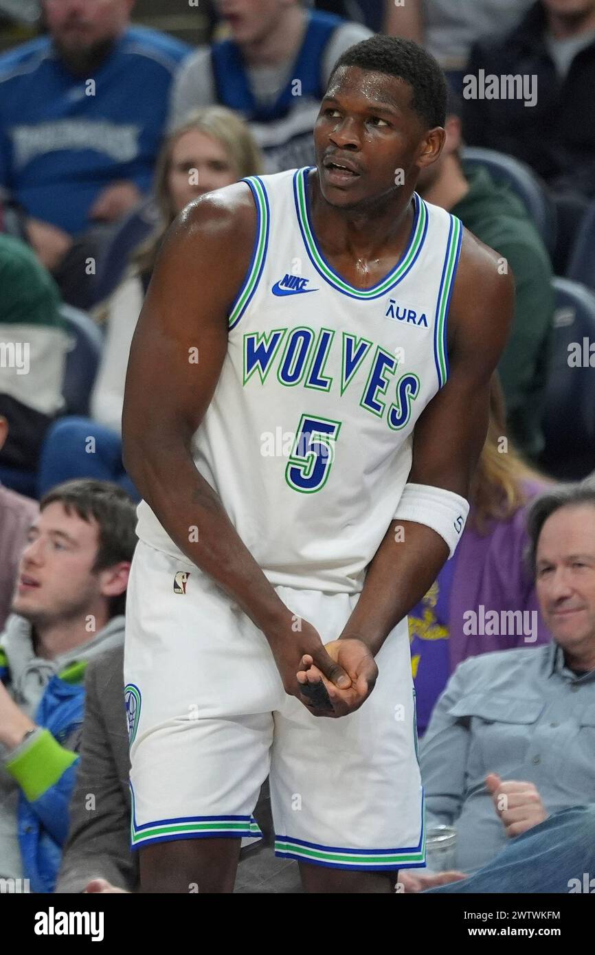 Minnesota Timberwolves guard Anthony Edwards (5) grabs his hand during ...