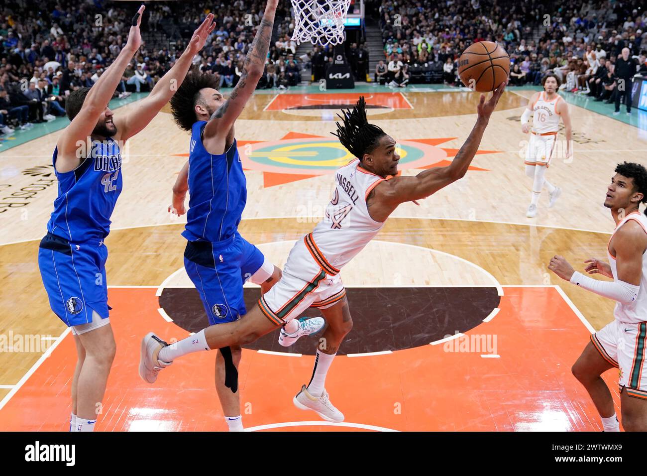 San Antonio Spurs guard Devin Vassell (24) tries to score in front of ...