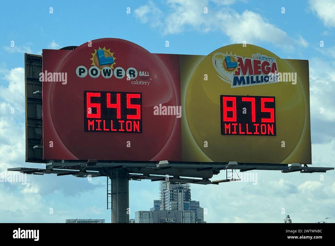 A billboard with the lottery jackpots of Power Ball (645 million) and ...