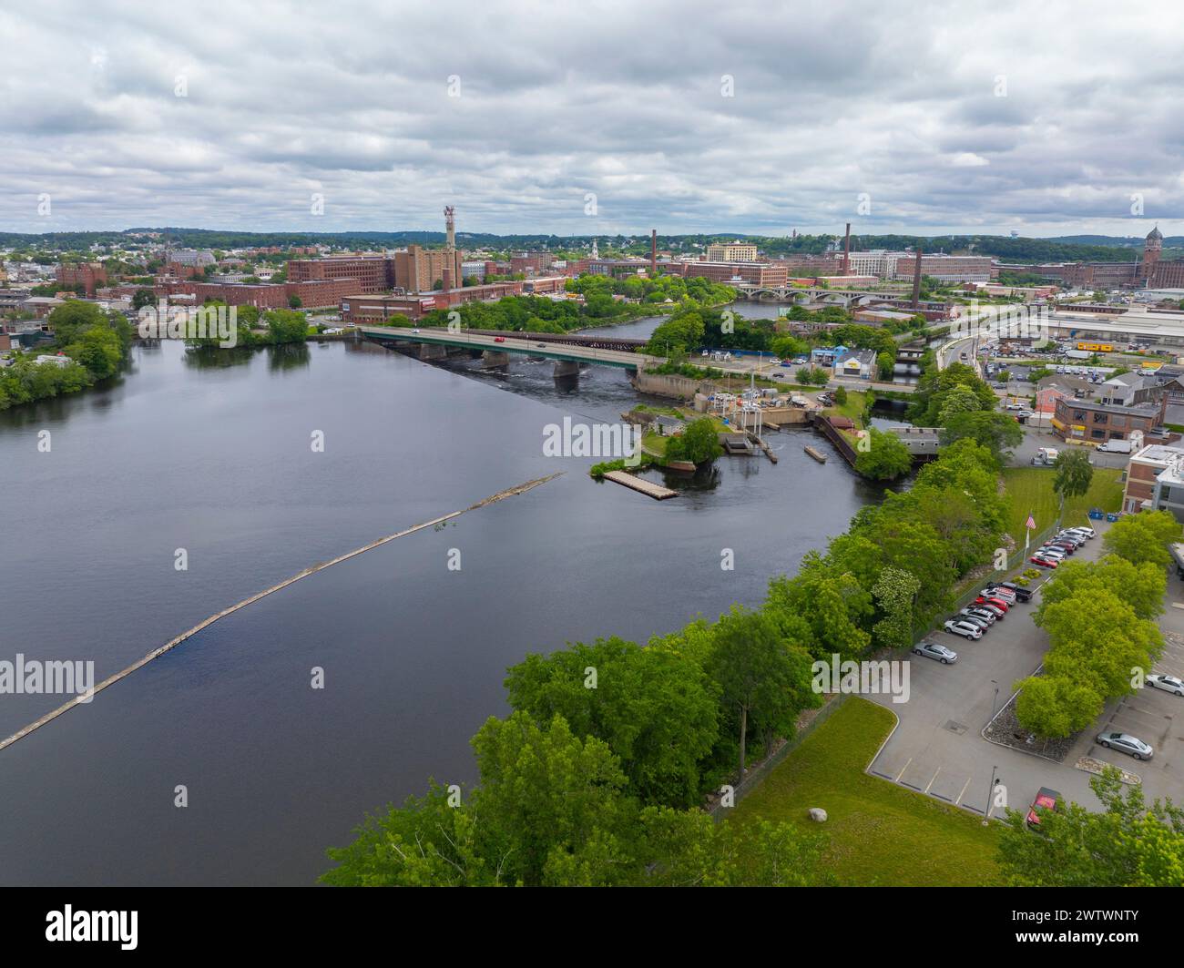 Atlantic Mills and Pemberton Park aerial view with River Bridge over Merrimack River in downtown ...