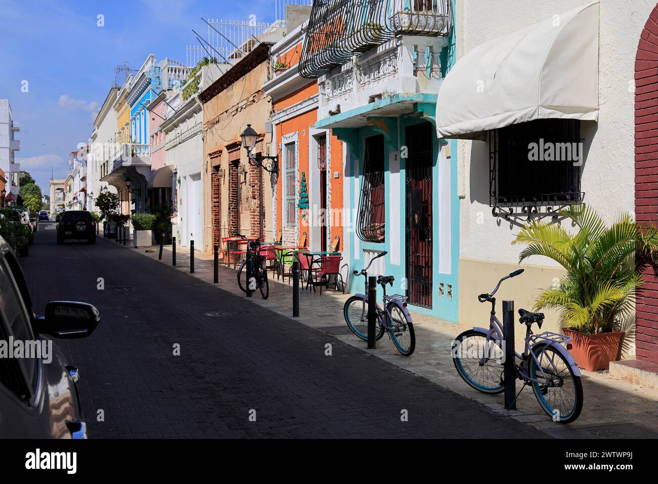 Calle Isabel La Catolica street with colorful historic architectures in ...
