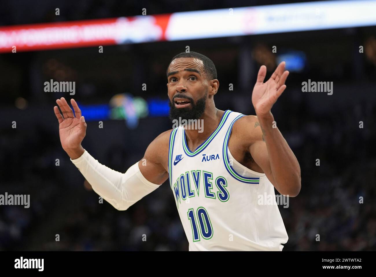 Minnesota Timberwolves guard Mike Conley (10) reacts after being called ...