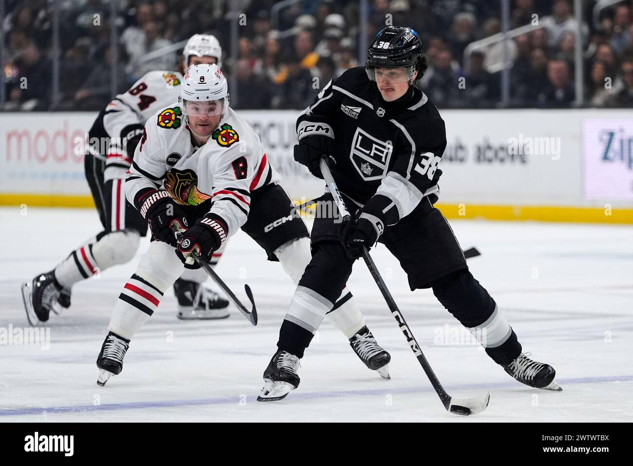 Los Angeles Kings center Alex Turcotte, right, and Chicago Blackhawks ...