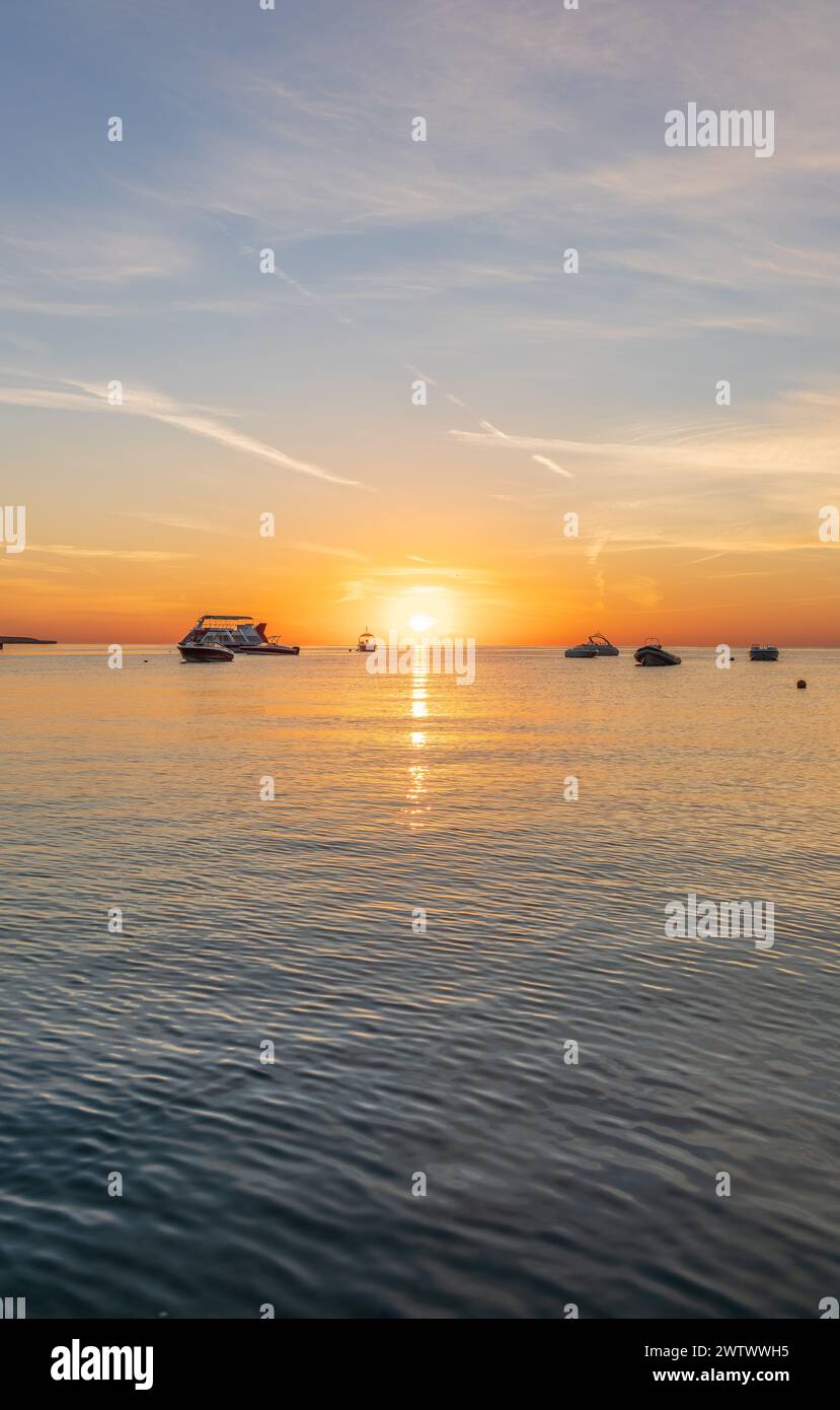 Sunrise over the sea. Panoramic seascape. Burning sky and shining ...
