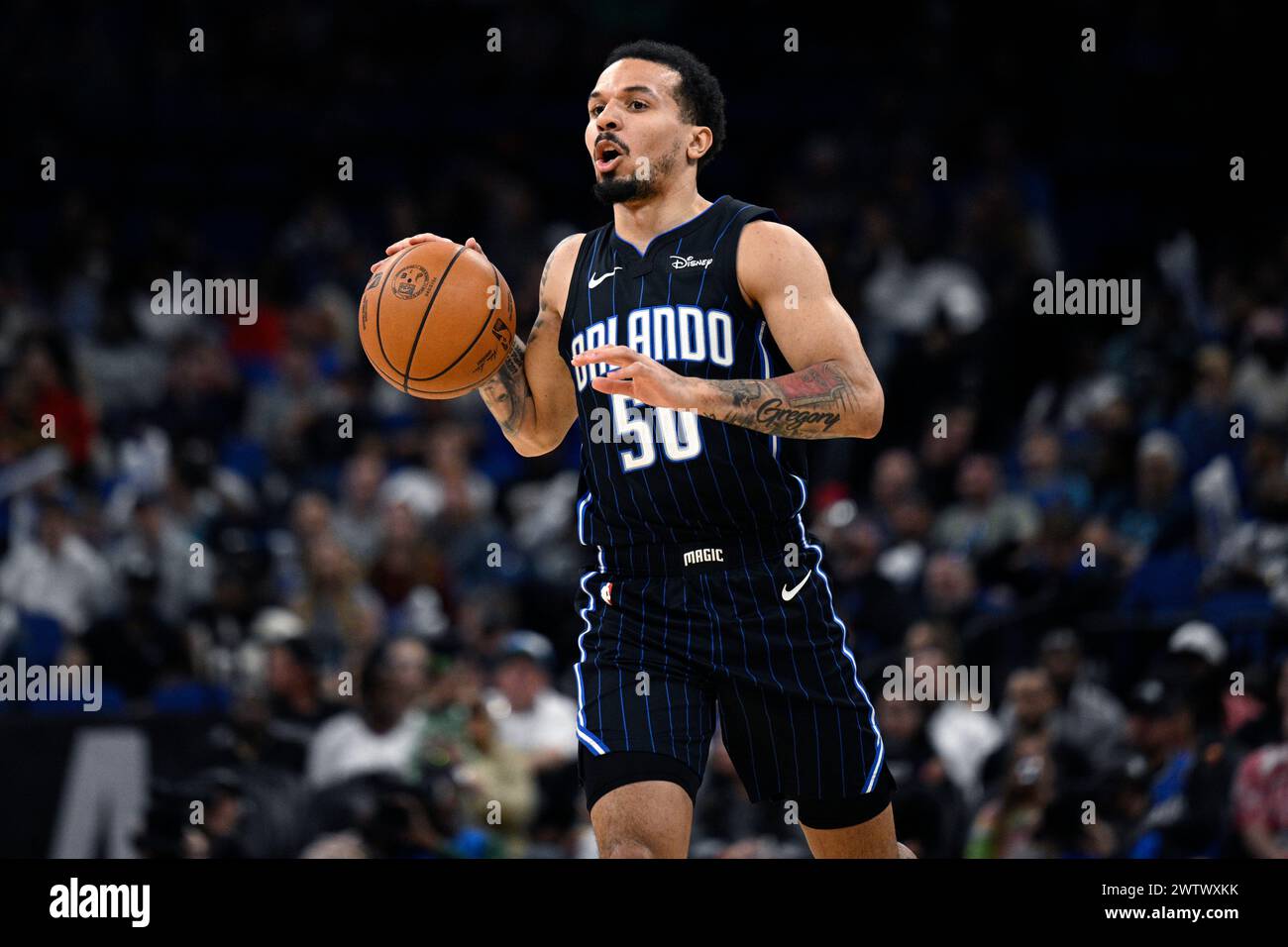 Orlando Magic guard Cole Anthony (50) brings the ball up the court ...
