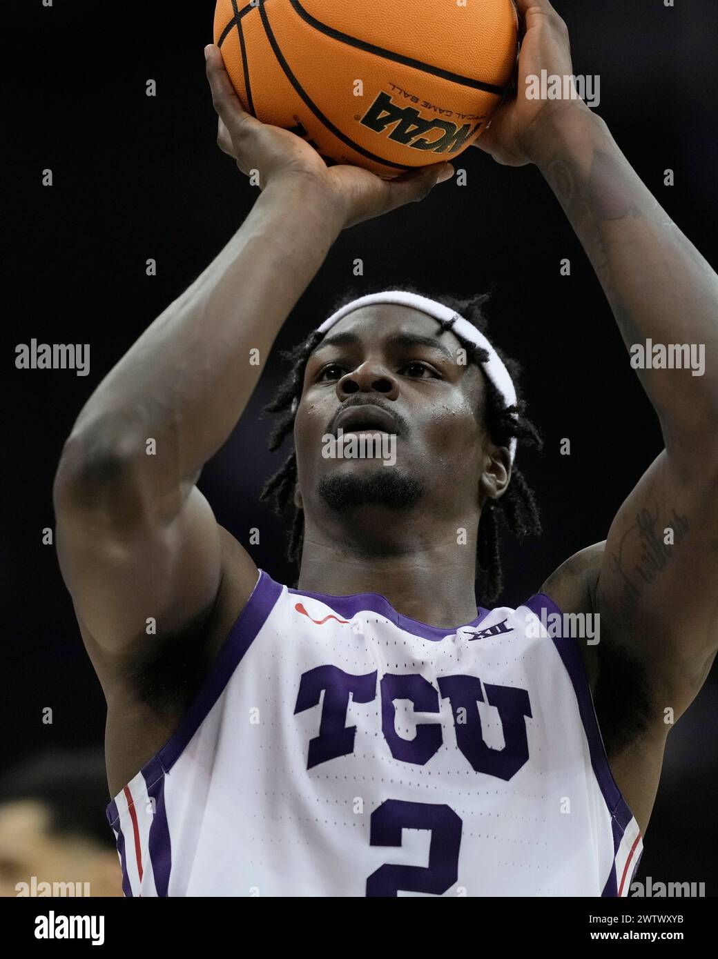 TCU forward Emanuel Miller shoots during the second half of an NCAA ...