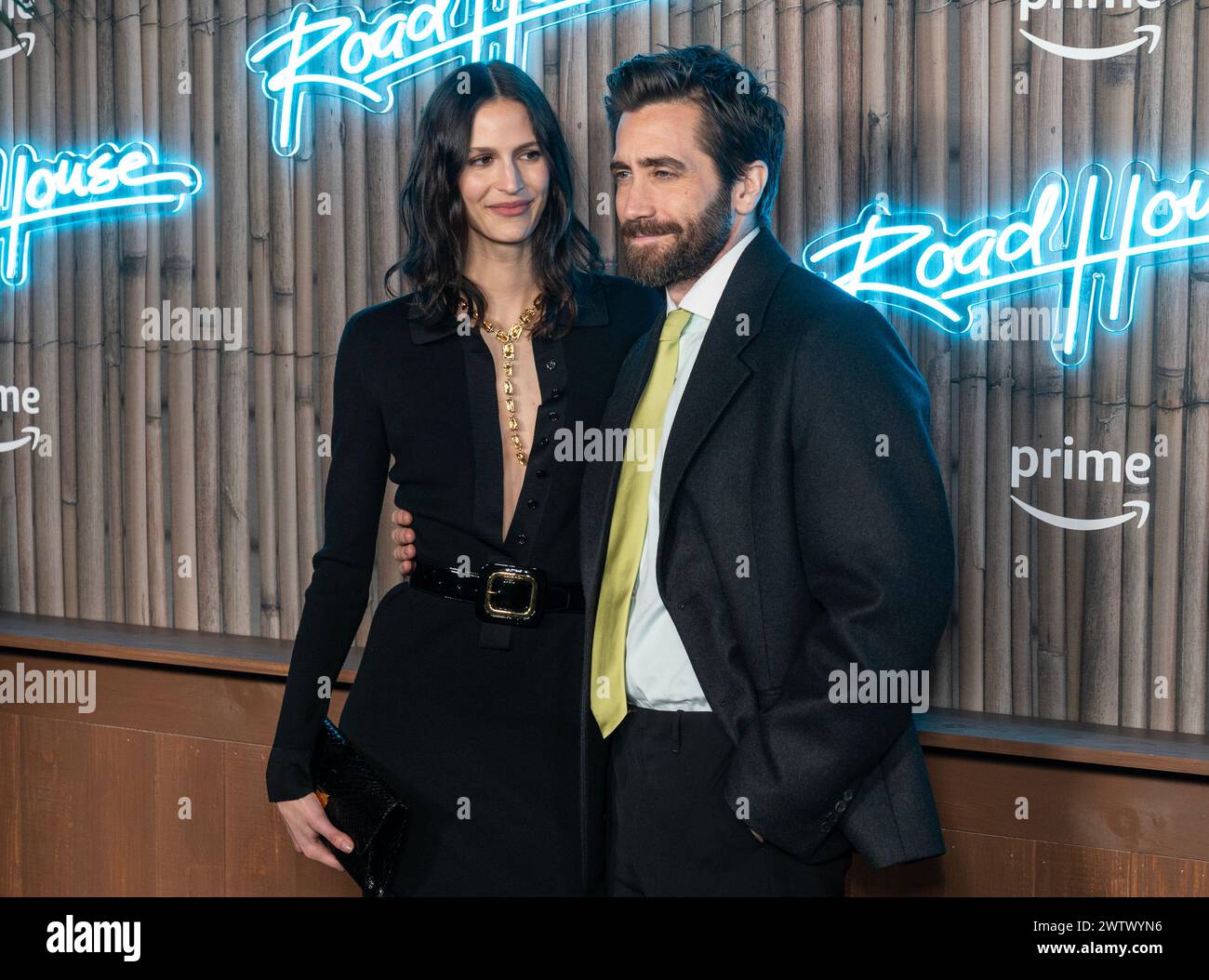 Jeanne Cadieu wearing dress by Prada and Jake Gyllenhaal attend ...