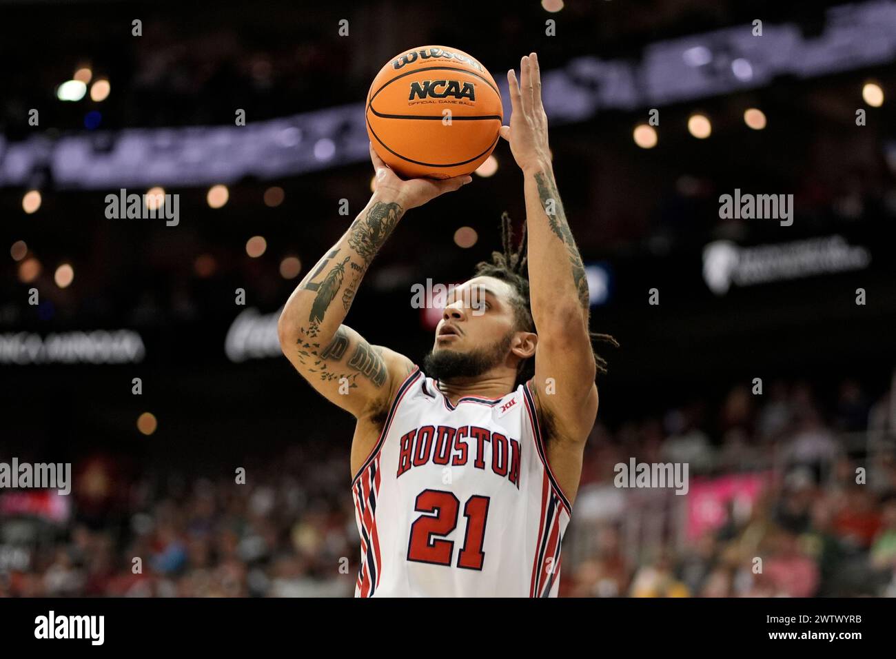 Houston guard Emanuel Sharp shoots during the second half of an NCAA ...