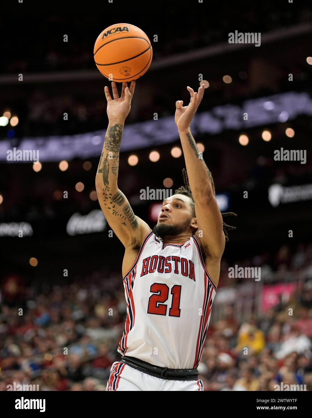 Houston guard Emanuel Sharp shoots during the second half of an NCAA ...