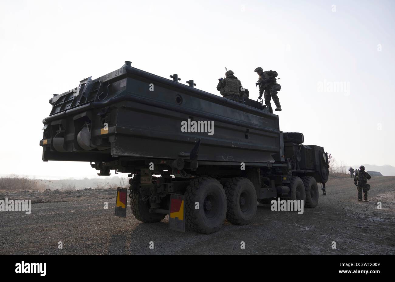 U.S. soldiers from the 11th Engineer Battalion and 2nd Infantry ...