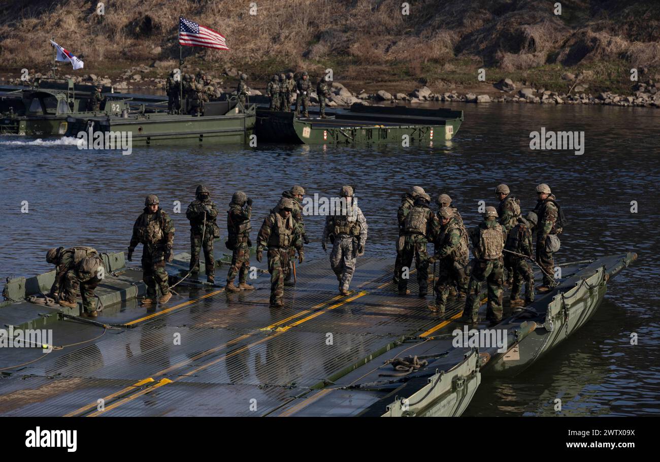U.S. soldiers from the 11th Engineer Battalion and 2nd Infantry ...