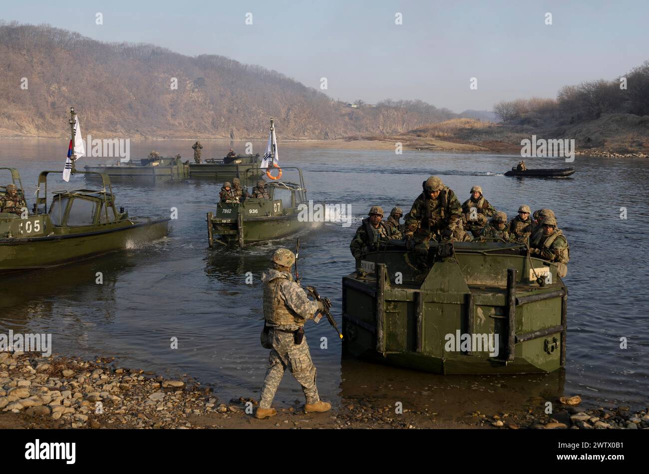 U.S. soldiers from the 11th Engineer Battalion and 2nd Infantry ...