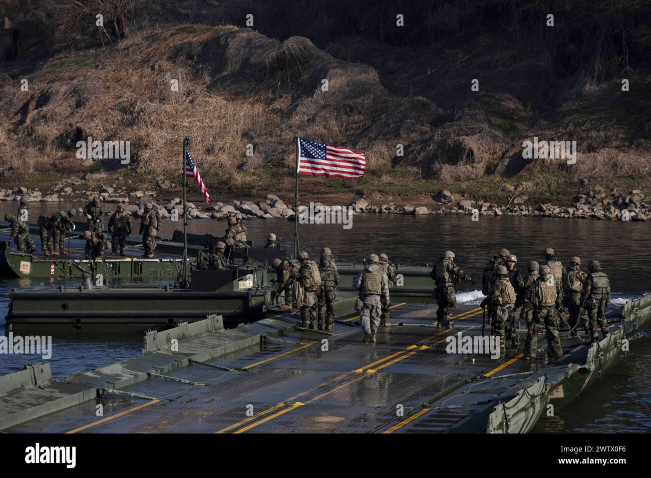 U.S. soldiers from the 11th Engineer Battalion and 2nd Infantry ...