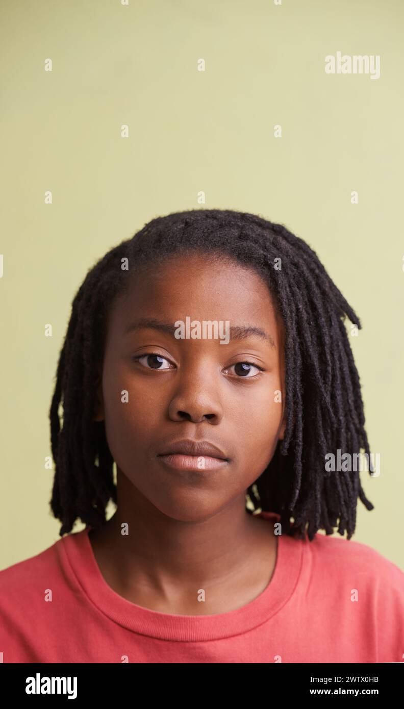 African boy, portrait and fashion in studio with creative, style and ...