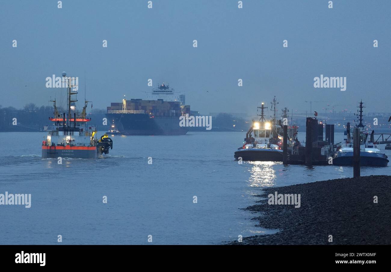 Hamburg, Germany. 20th Mar, 2024. A large container ship sails into the ...